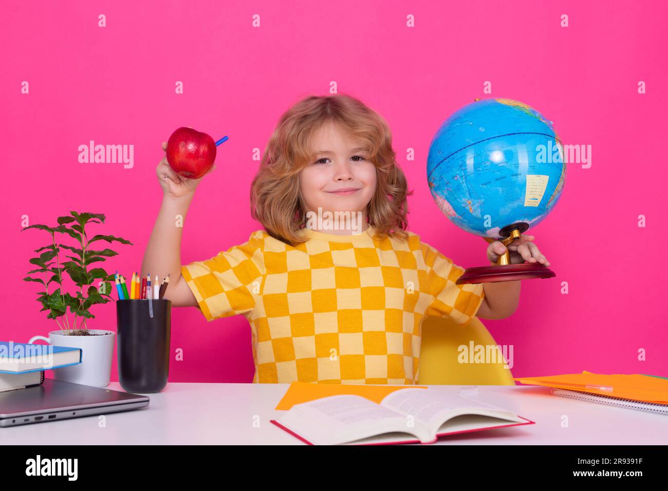 Back to school. Funny little boy from elementary school with book ...
