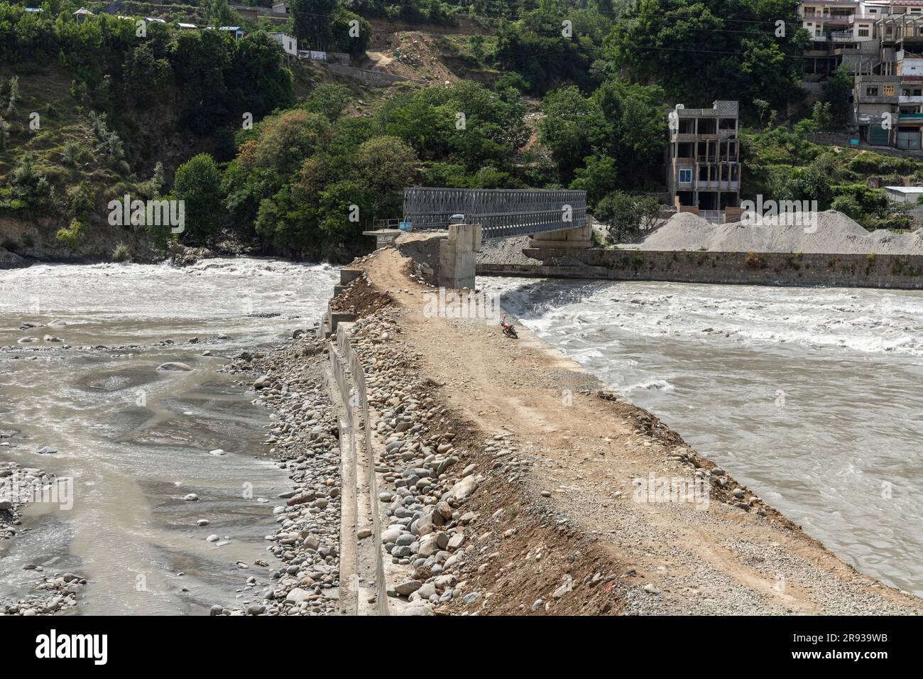 Washed out flood damaged of a road at madyan that connects the villages ...