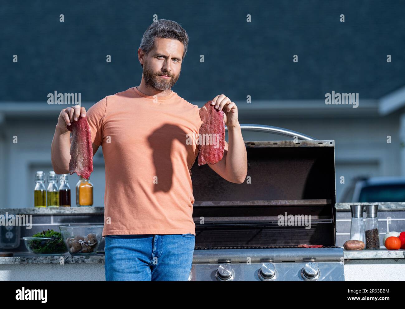 Tending rib steak cooking in hi-res stock photography and images - Alamy