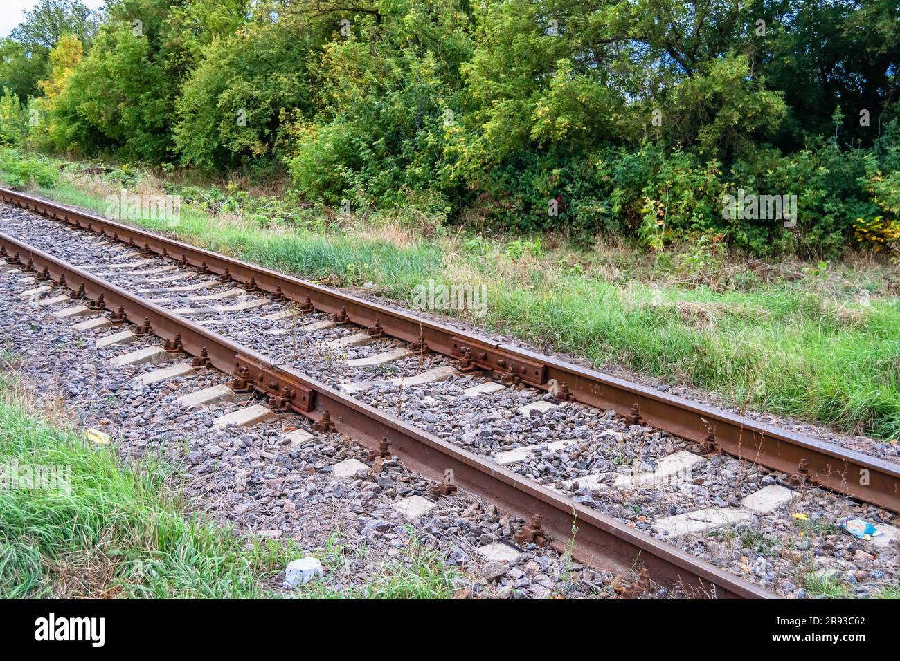 Photography to theme railway track after passing train on railroad, photo consisting of long ...