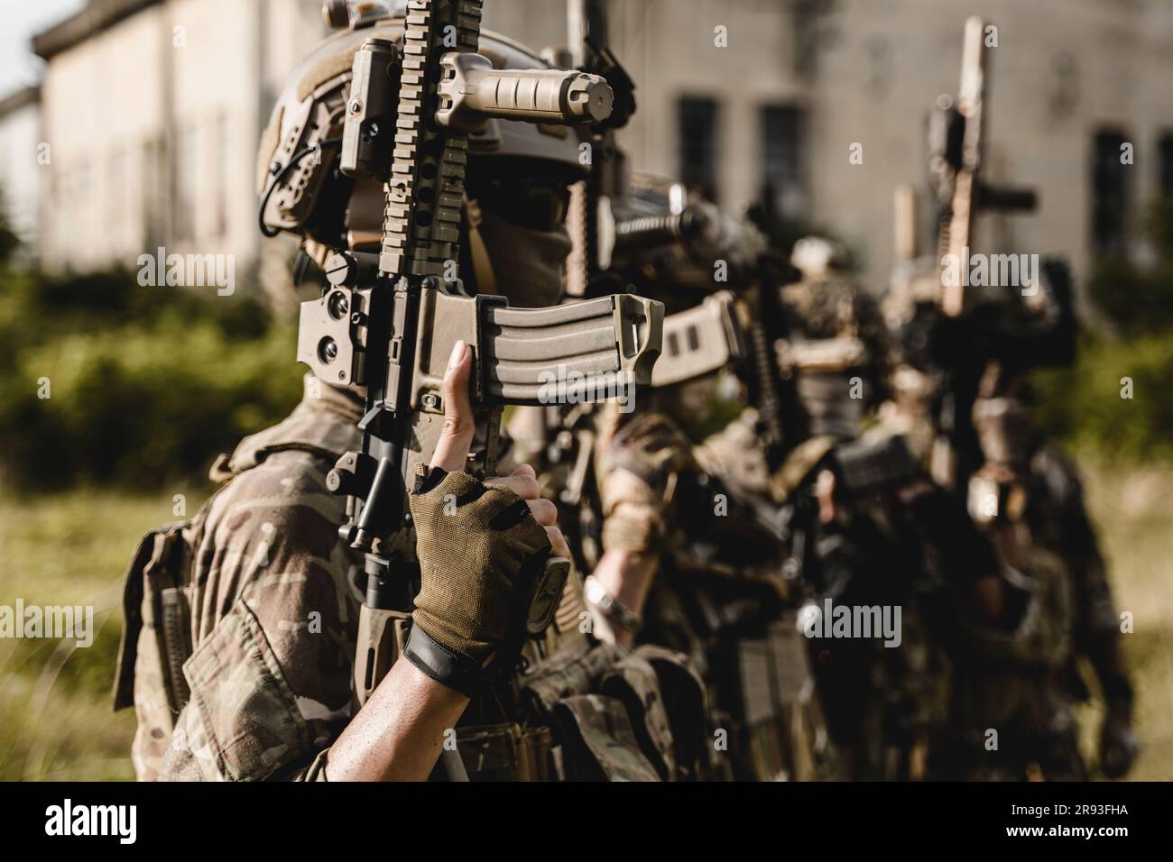 Smart teamwork of soldiers running forward and attacking enemy Stock ...