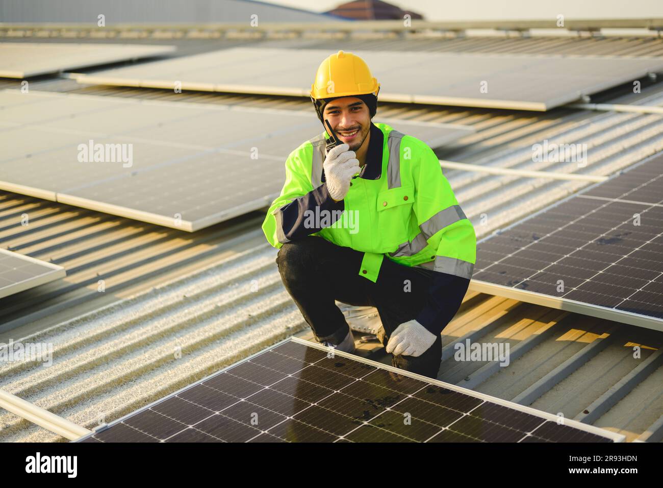 Engineer worker working at solar cell power plant with sunset Stock ...