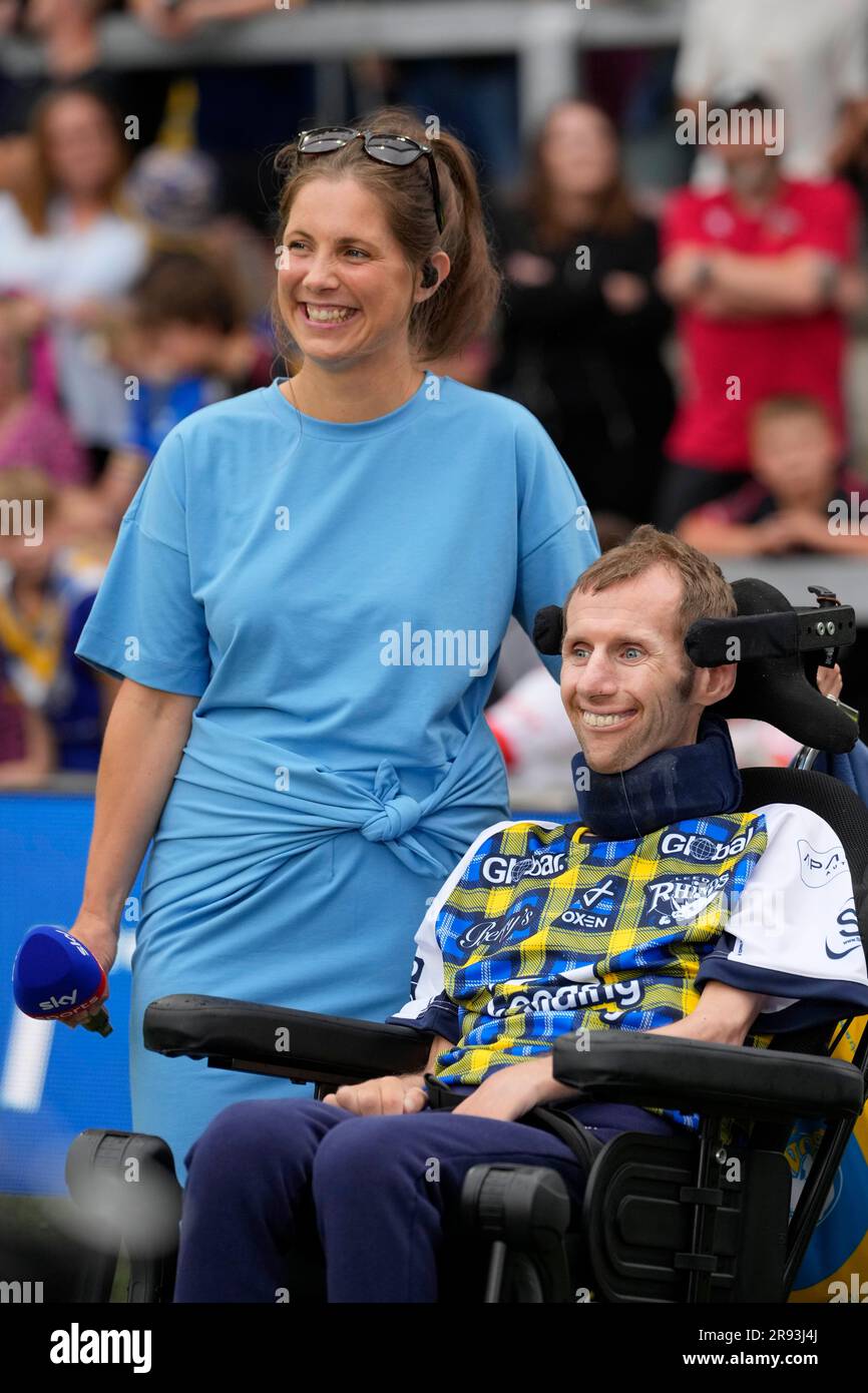 Lindsay Burrow and her husband Rob Burrow on the pitch before the Motor ...