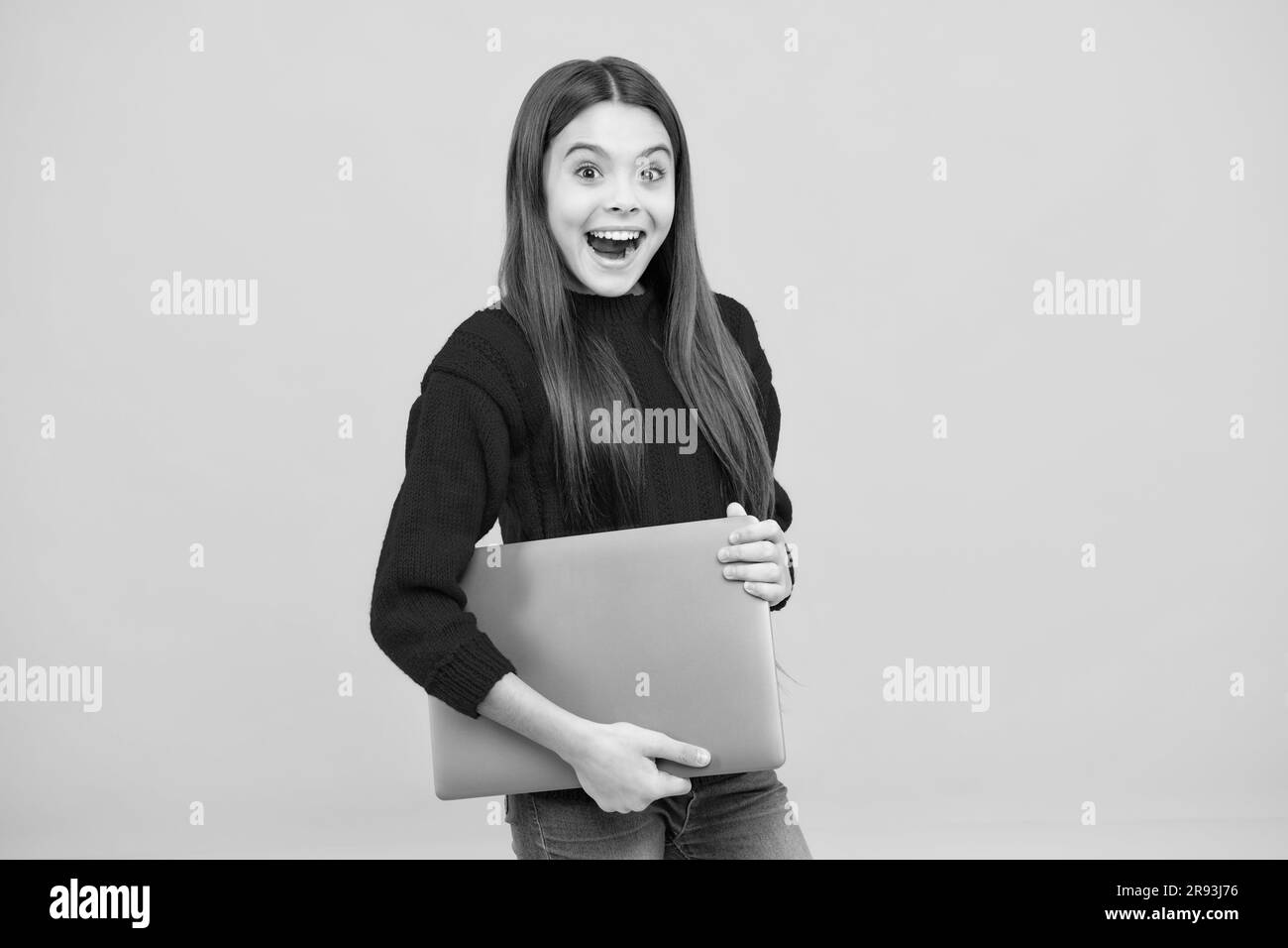 Excited face. Student teenager schoolgirl with laptop on isolated ...
