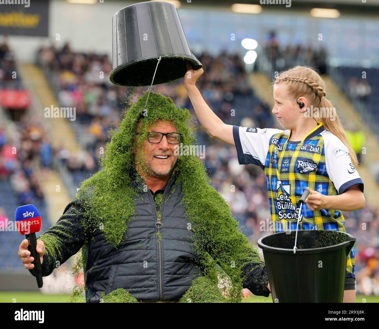Rob Burrows Daughters Maya and Macy pour buckets of grass over the head ...