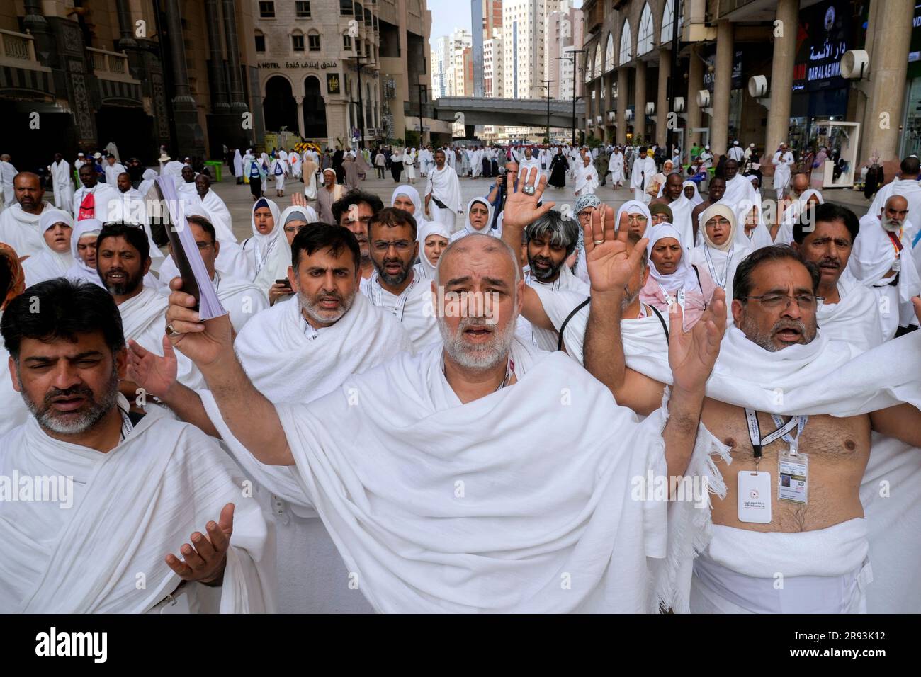 Pakistani pilgrim Mubarak Ali Shah leads pilgrims as they pray outside ...