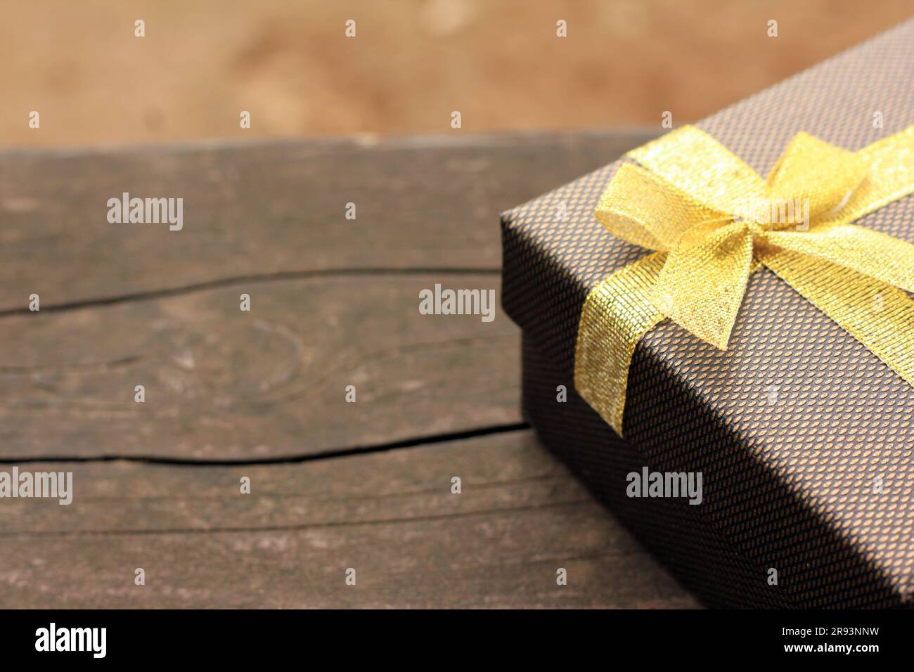 Various shots of gift boxes with sunlight on the park lawn on a summer ...