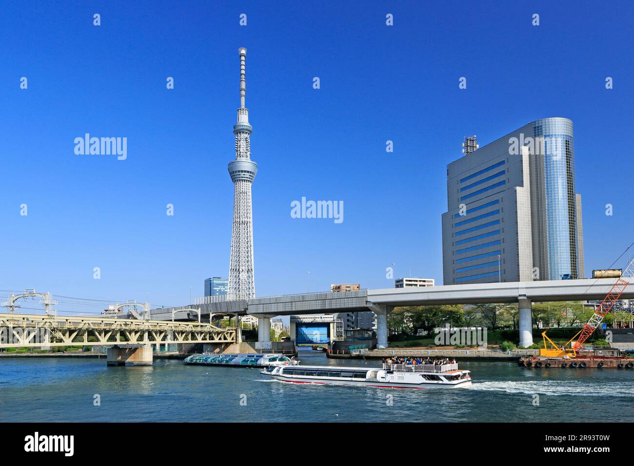Water bus on the Sumida River and Tokyo Sky Tree Stock Photo - Alamy