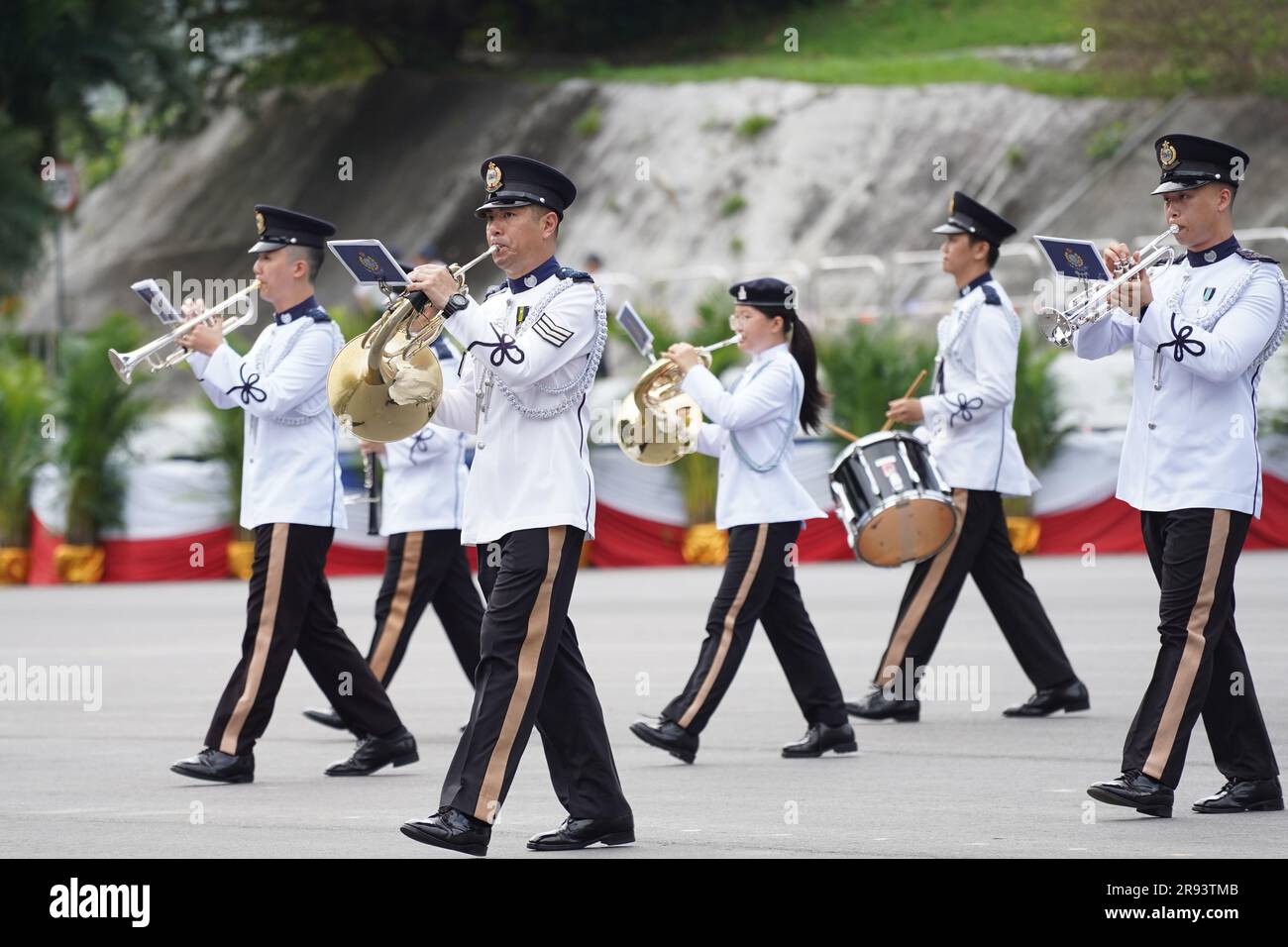 The marching band of Hong Kong Police Force march during the parade. A ...