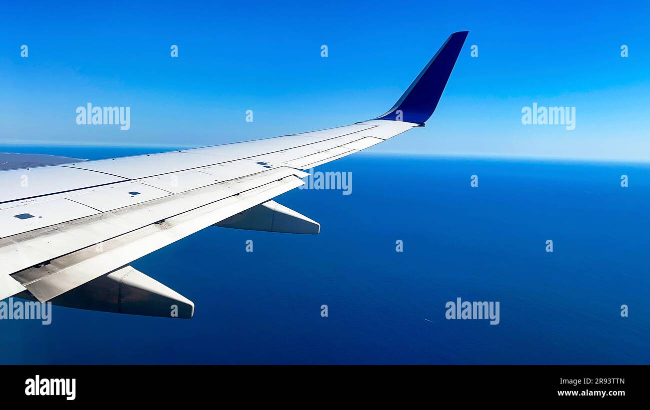 Commercial aircraft flying over the sea of cuts and approaching the ...