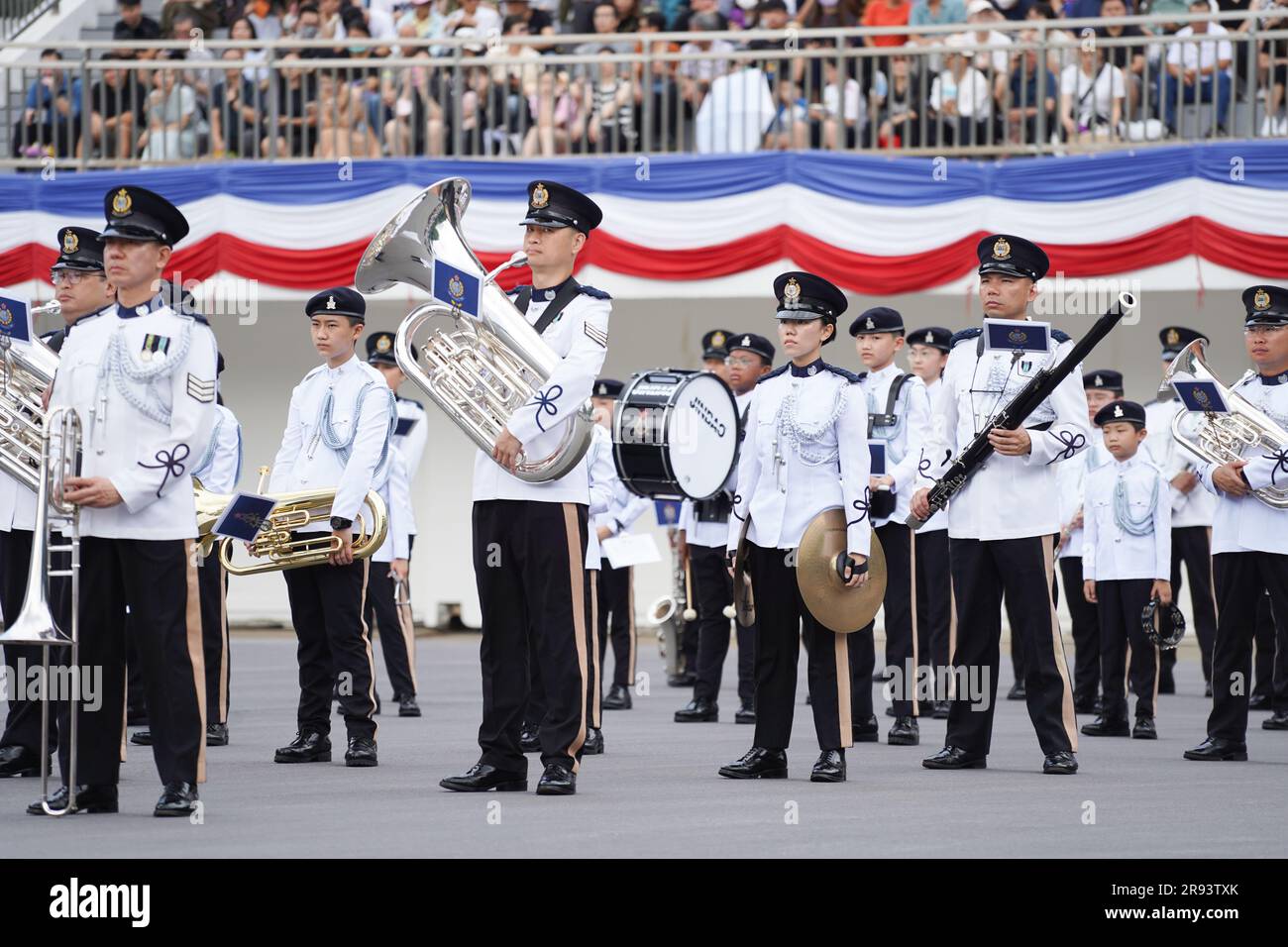 The marching band of Hong Kong Police Force march during the parade. A ...