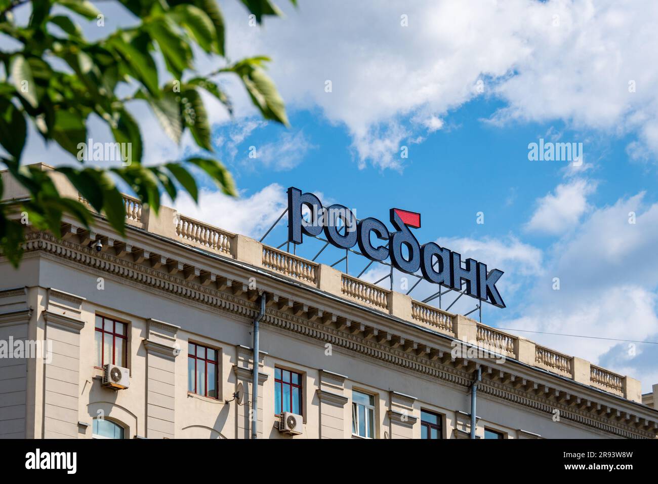 Sign and logo of the Russian bank Rosbank on the rooftop of a building ...