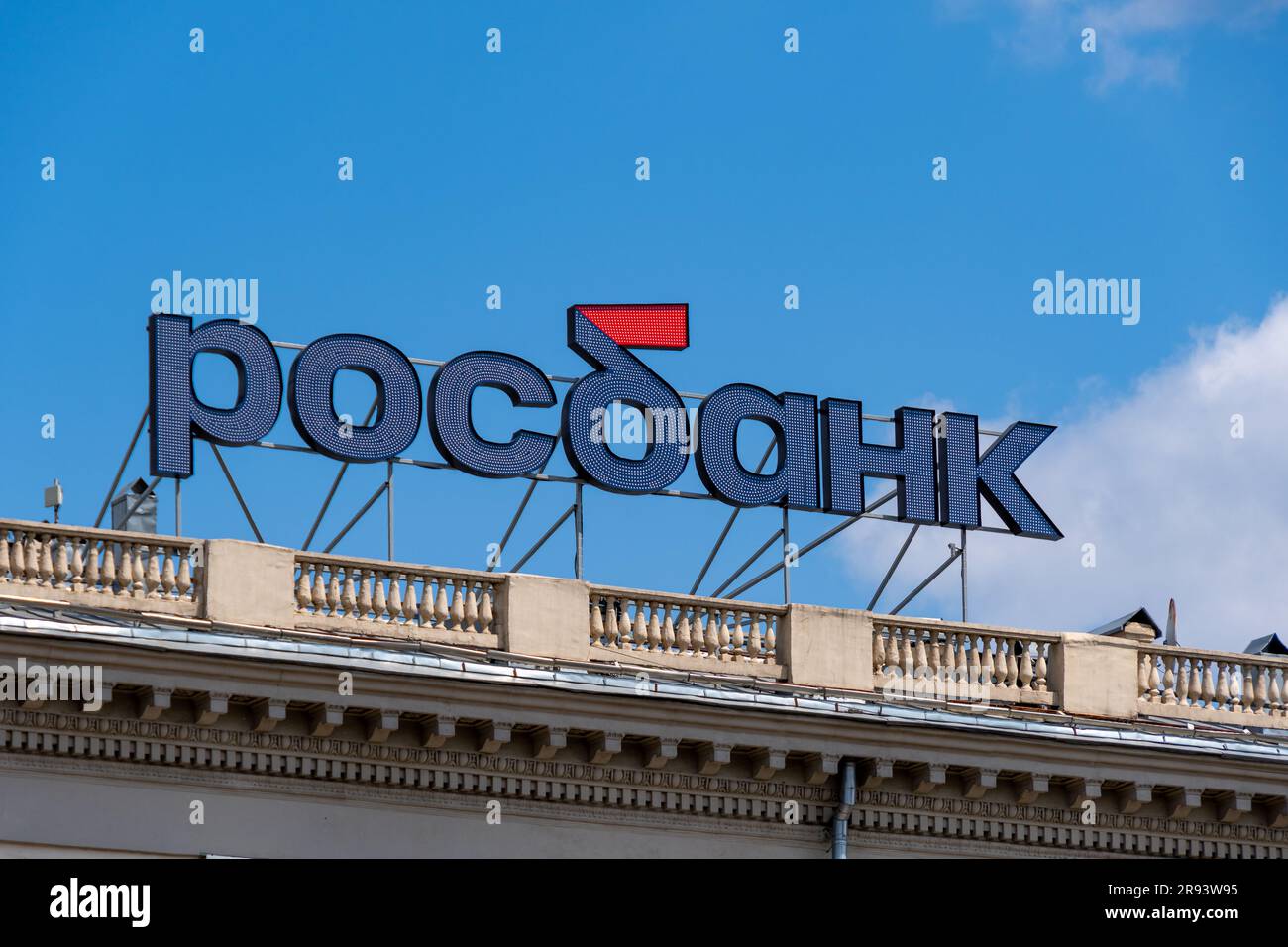 Sign and logo of the Russian bank Rosbank on the rooftop of a building ...