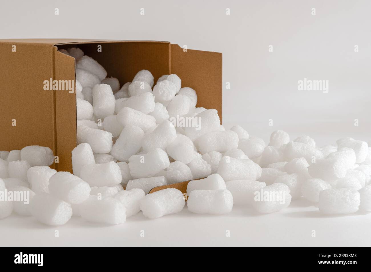Cardboard box isolated on the white background filled with packing ...