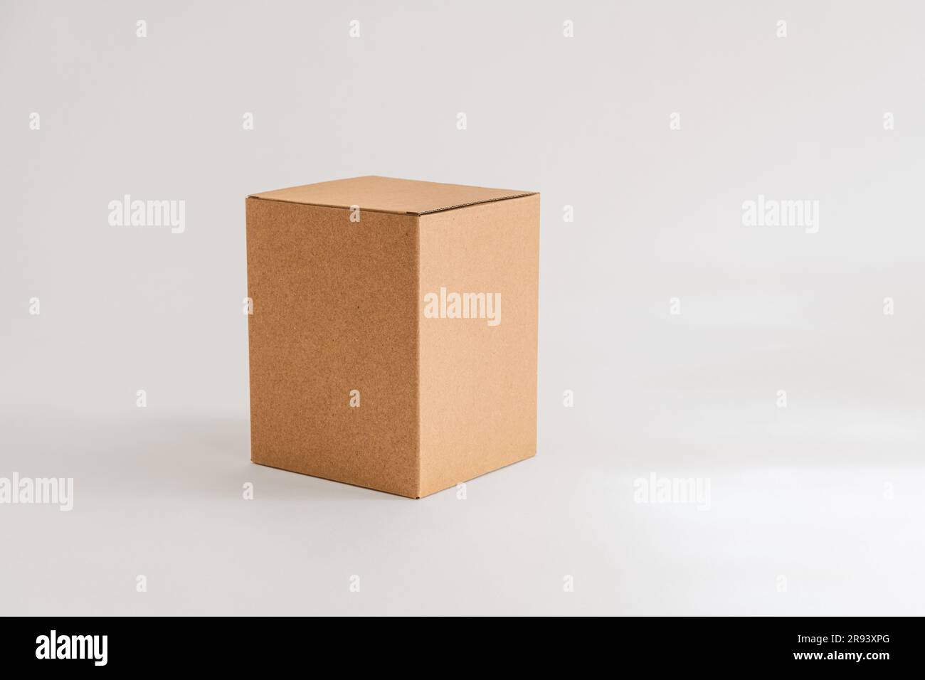 Closed cardboard box isolated on the white background Stock Photo - Alamy