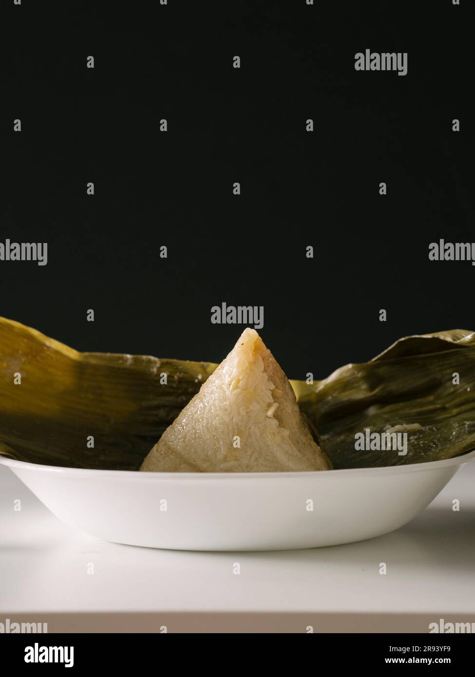 Banana Leaf Wrapped Pyramid Shaped Glutinous Rice Dumpling with Meat ...