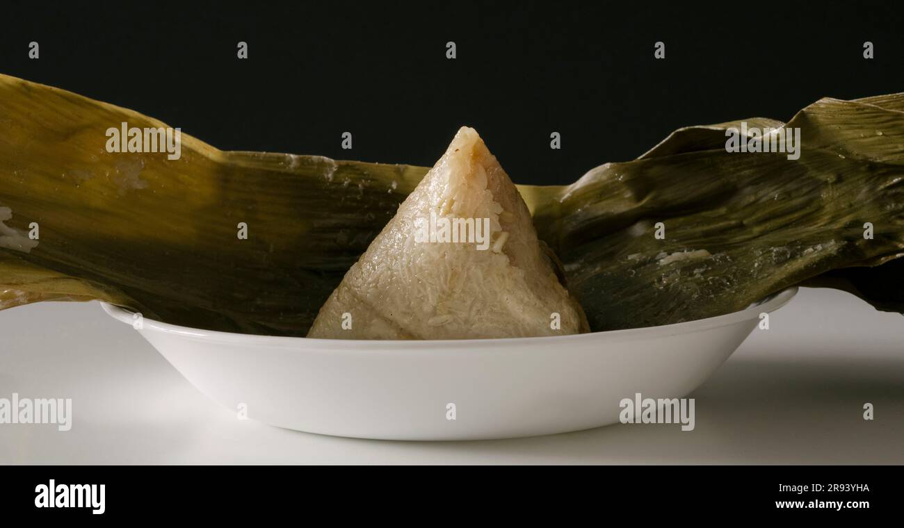 Banana Leaf Wrapped Pyramid Shaped Glutinous Rice Dumpling with Meat ...