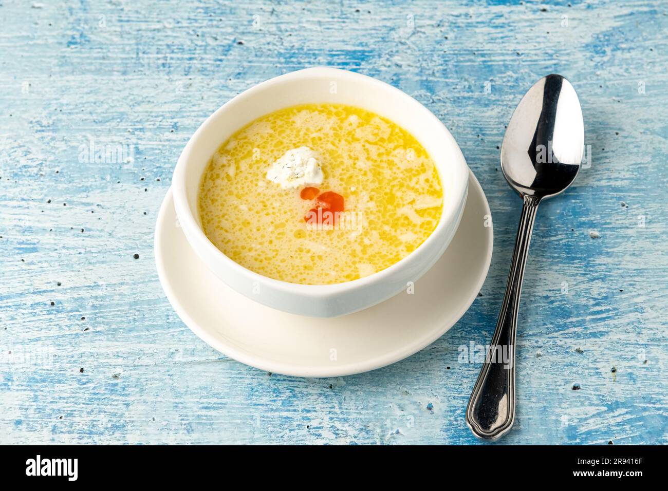 Seasoned fish soup on a white porcelain plate Stock Photo - Alamy