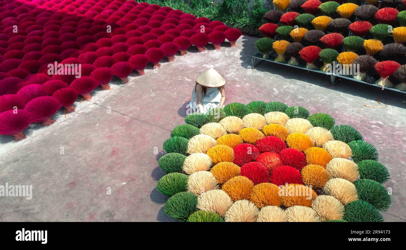 Traditional village workers of Ung Hoa incense are doing the incense ...