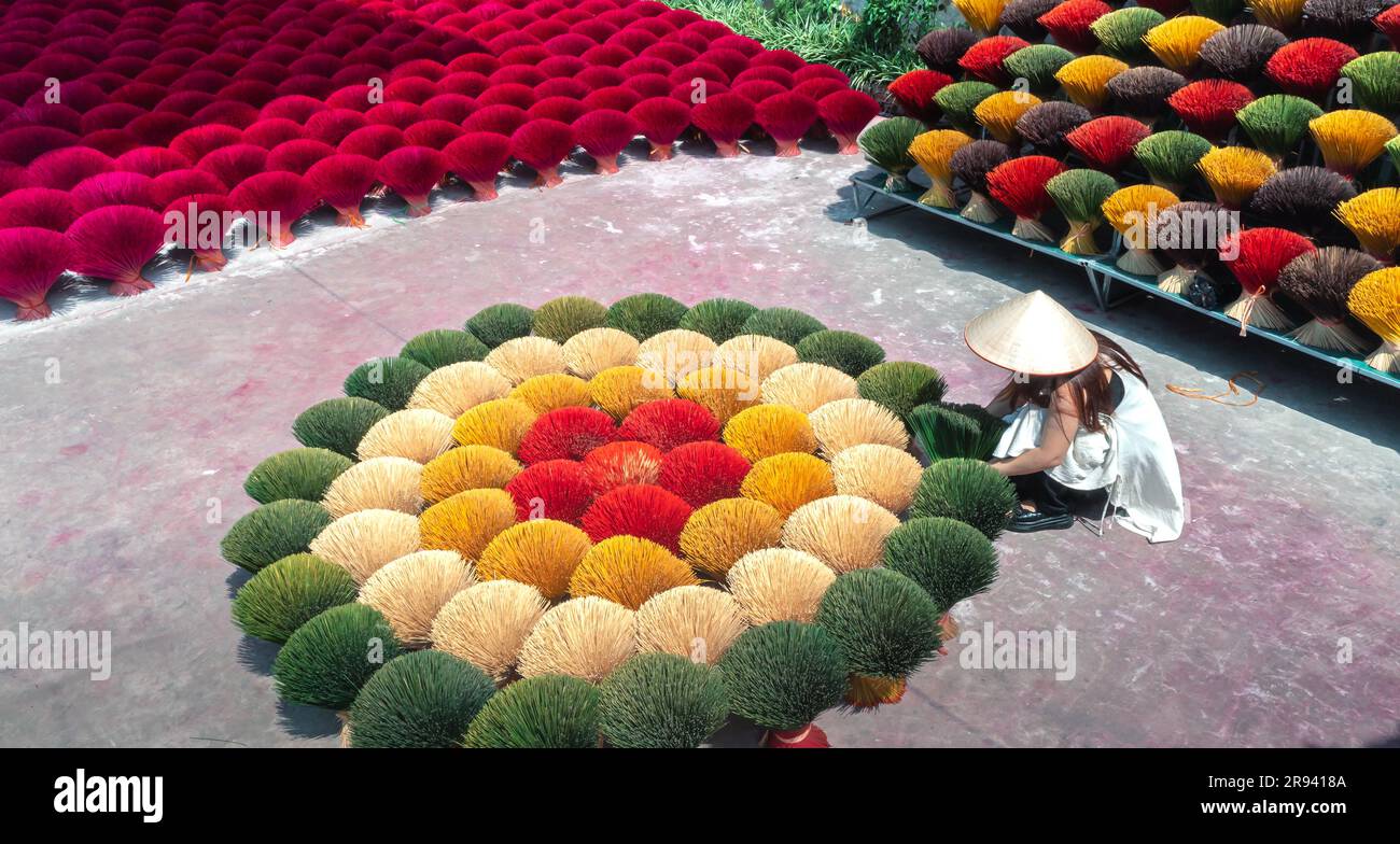 Traditional village workers of Ung Hoa incense are doing the incense ...