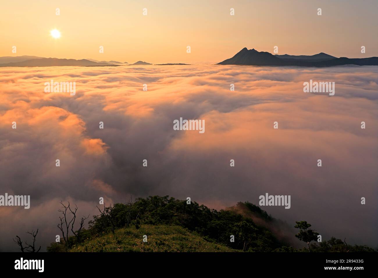 Lake Mashu and Mt. Mashu in the Mist at Sunrise Stock Photo - Alamy