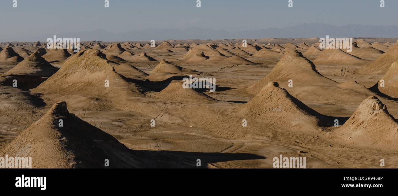 A large dune of golden Yardang sandy terrain in Qinghai Province, China ...