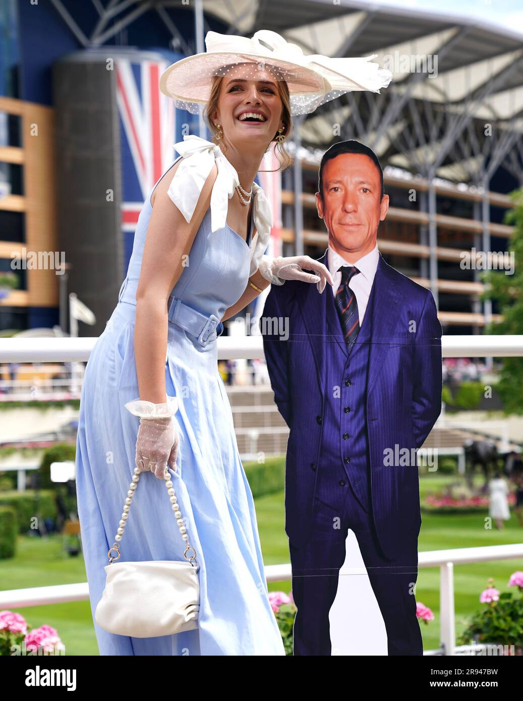Fiona Andrew poses for a cutout of jockey Frankie Dettori during day five of Royal Ascot at ...