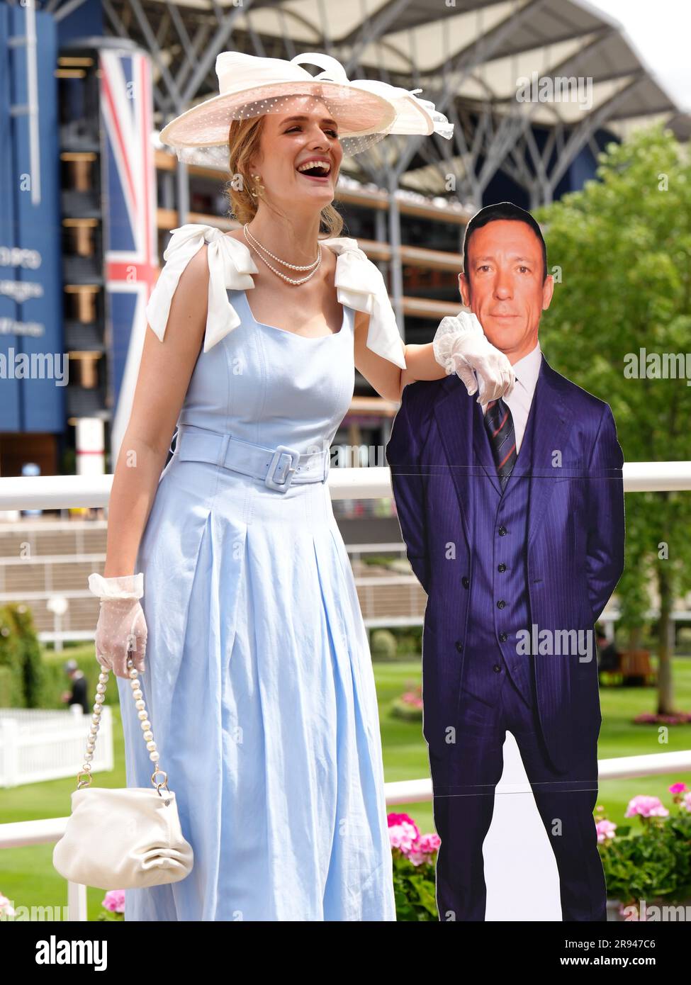 Fiona Andrew poses for a cutout of jockey Frankie Dettori during day ...
