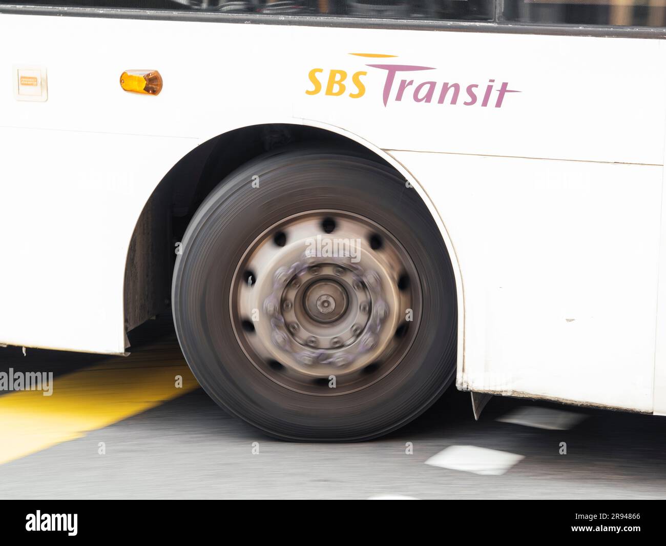 Close up of SBS Transit public bus driving on Singapore Road with ...