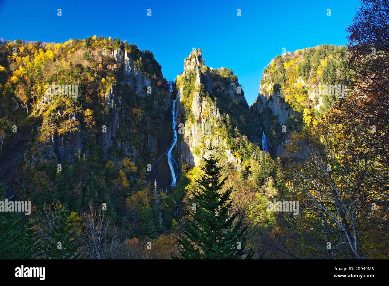 Autumn leaves of Ginga Falls and Meteor Falls Stock Photo - Alamy