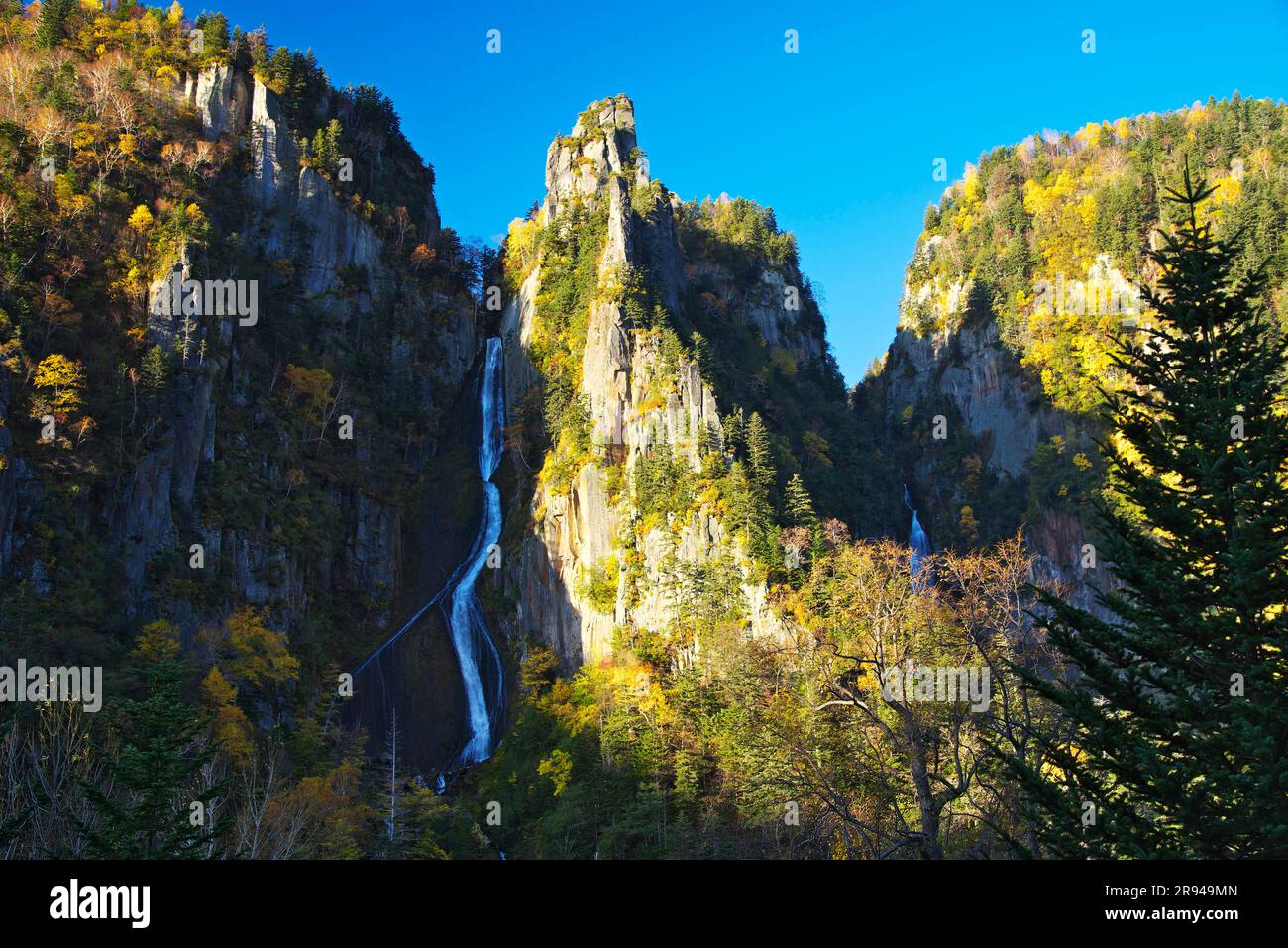 Autumn leaves of Ginga Falls and Meteor Falls Stock Photo - Alamy