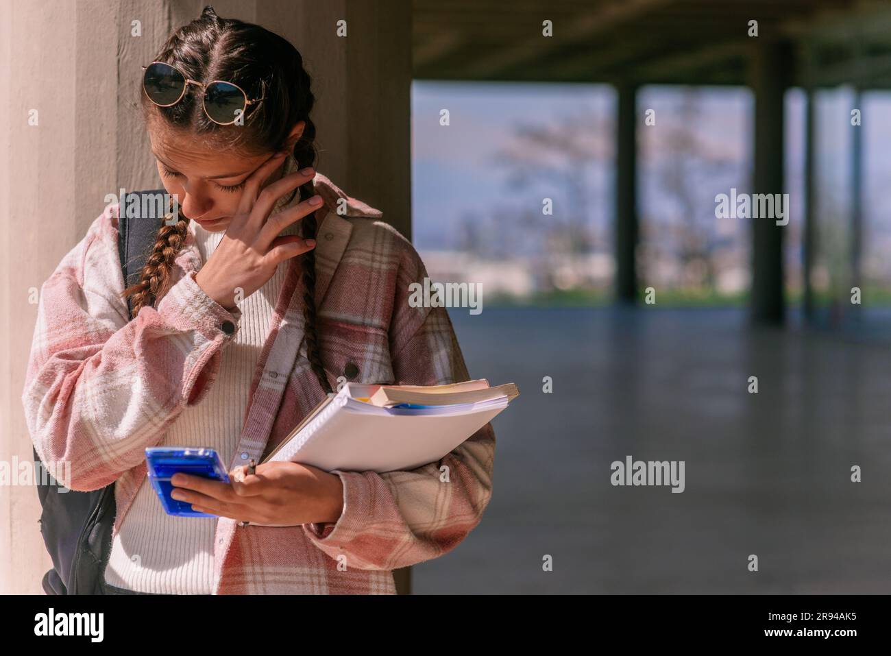 Upset school girl crying after she failed her school exam. She is ...