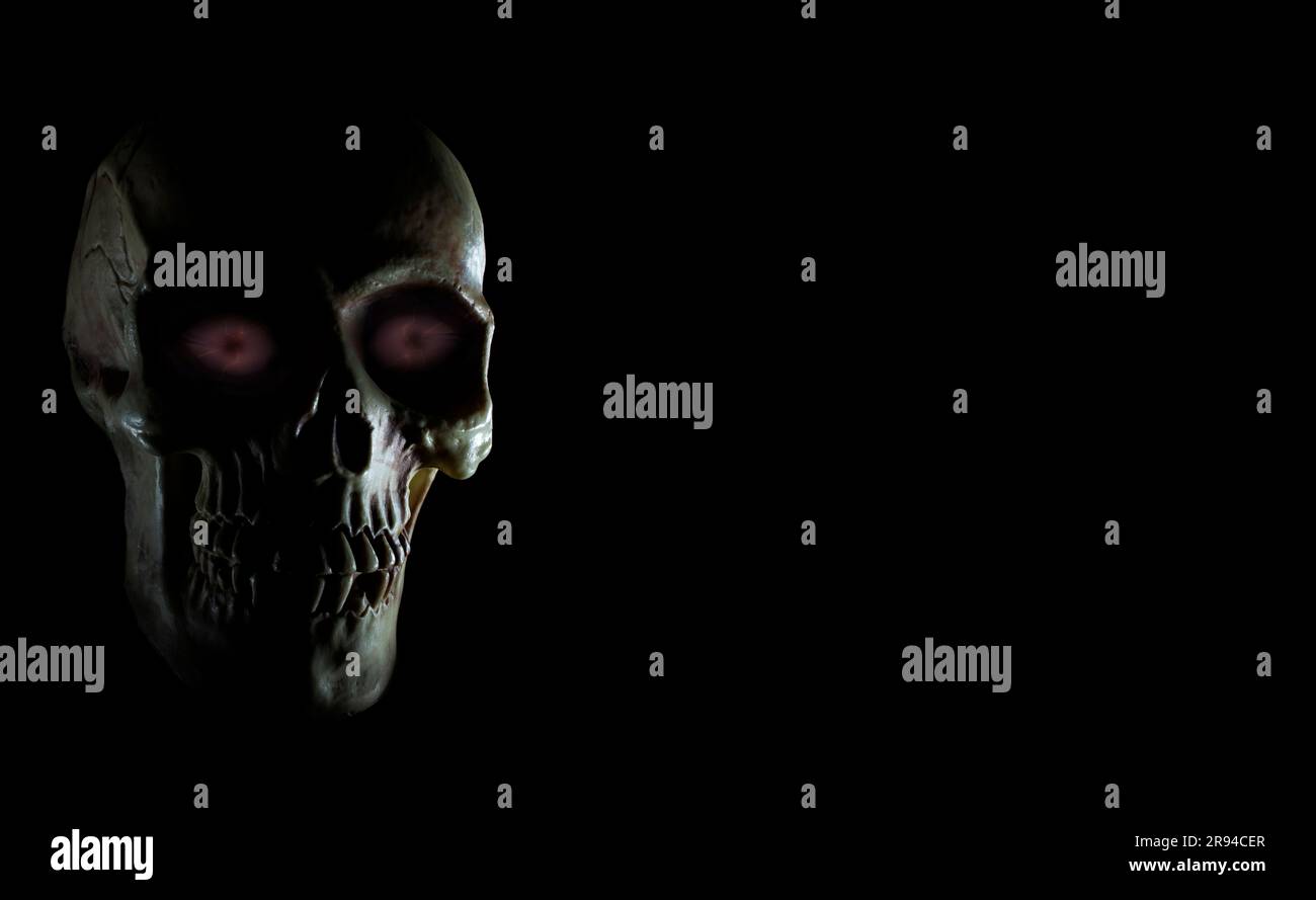 Purple glowing eyes on a human skull with copy space Stock Photo - Alamy