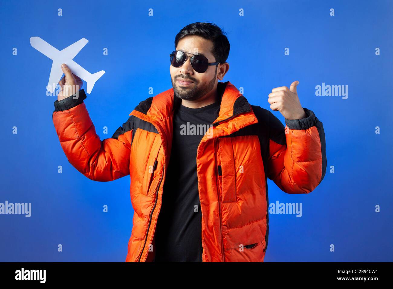 Travel destination, vacation, happy journey. A young man clutching ...