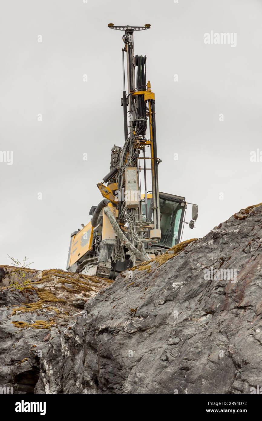 View on yellow big machine, construction site - Norway Stock Photo - Alamy