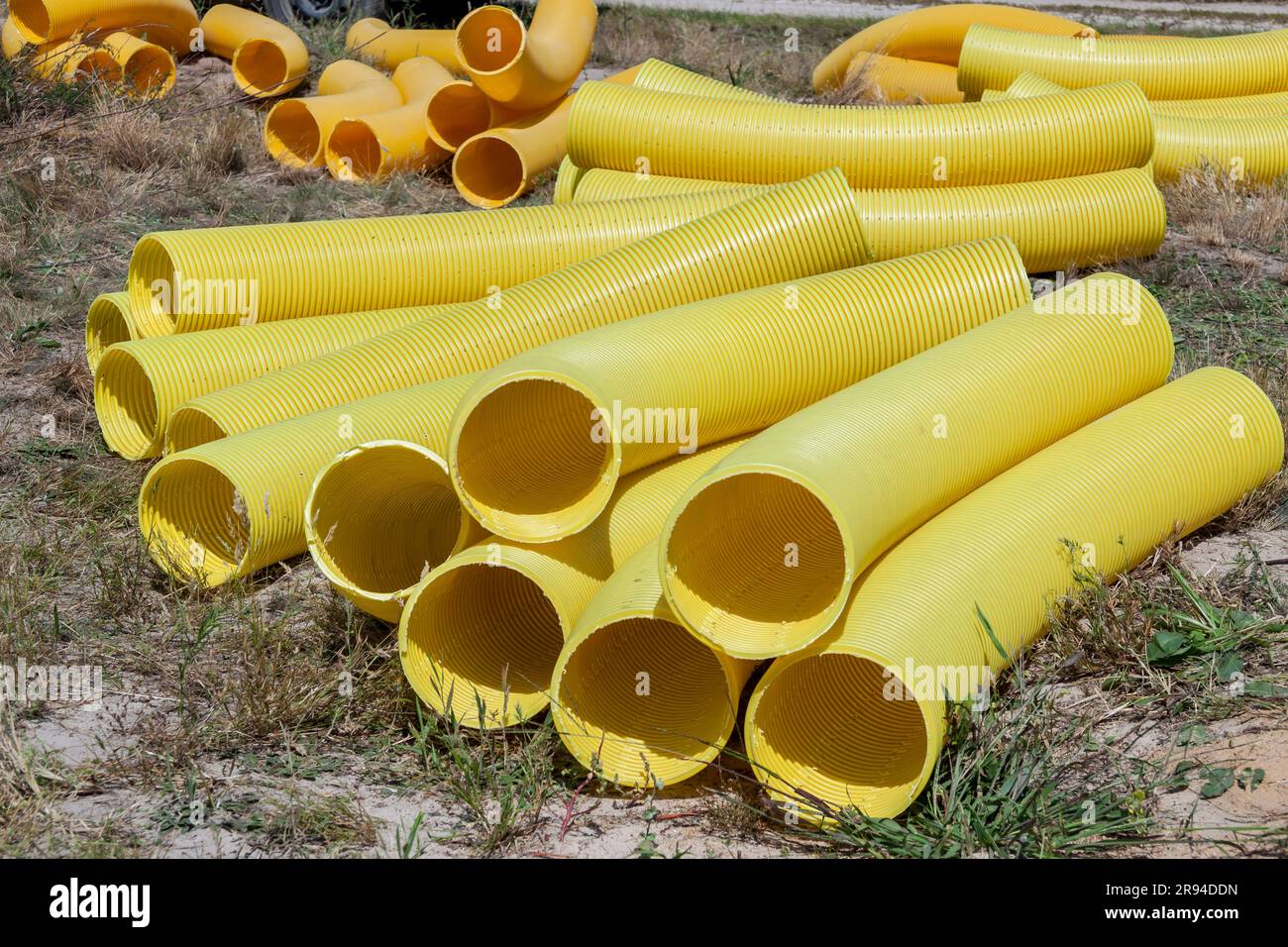 Yellow drain pipe - construction site Stock Photo - Alamy