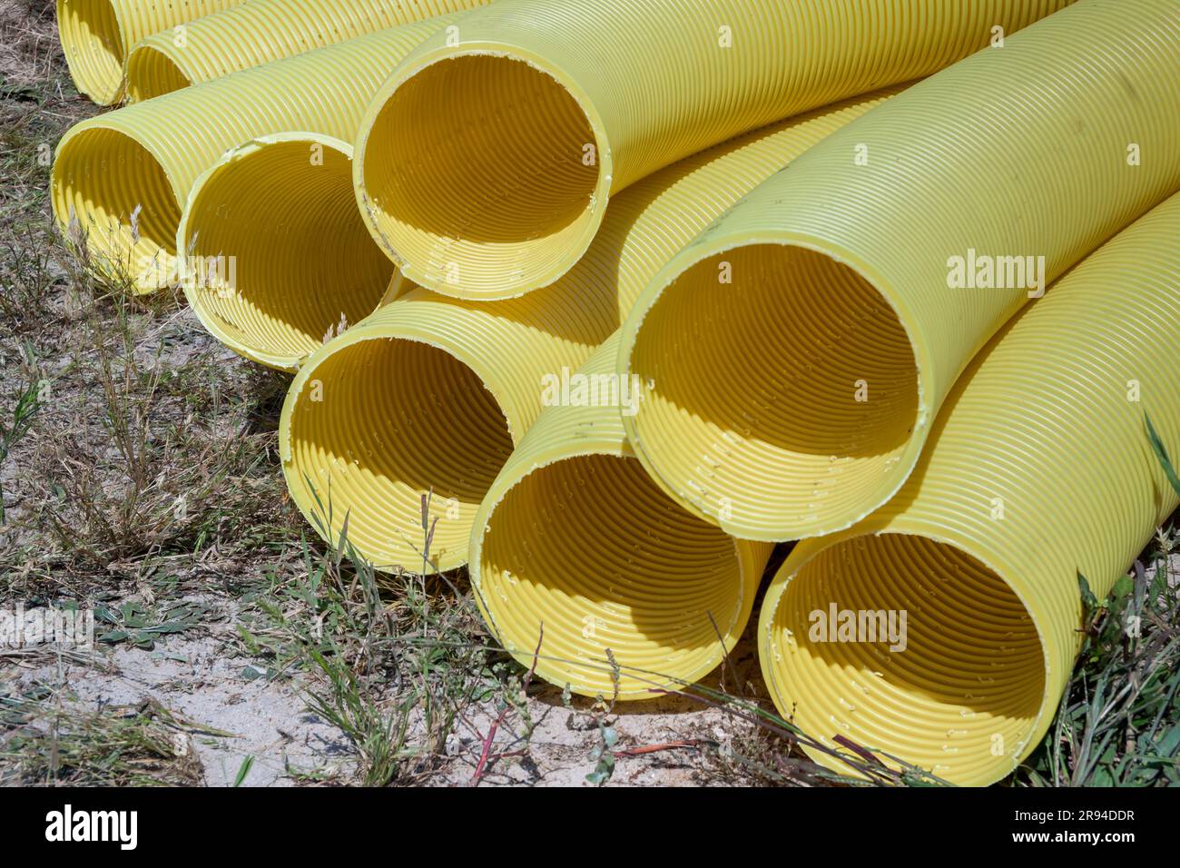 Yellow drain pipe - construction site Stock Photo - Alamy