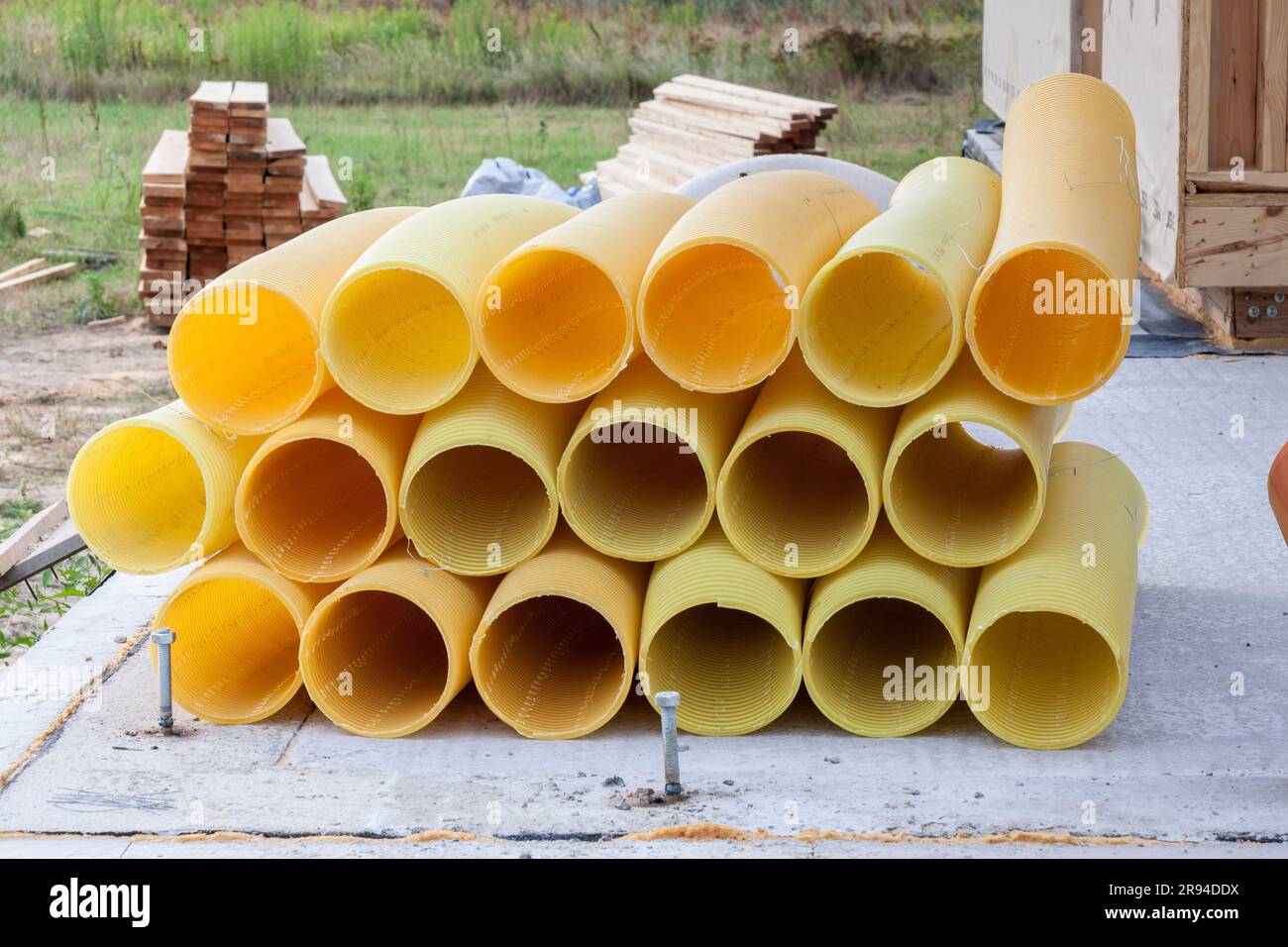 Yellow drain pipe - construction site Stock Photo - Alamy