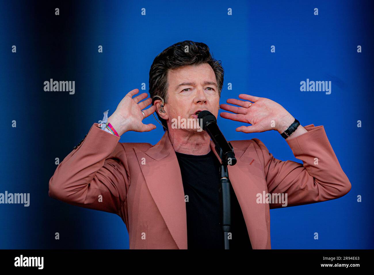 Rick Astley performs on the Pyramid Stage at the Glastonbury Festival ...