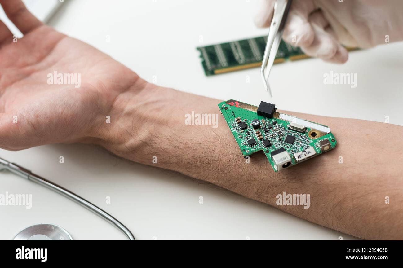 The man shows his hand with a chip implanted. The concept of chipping ...