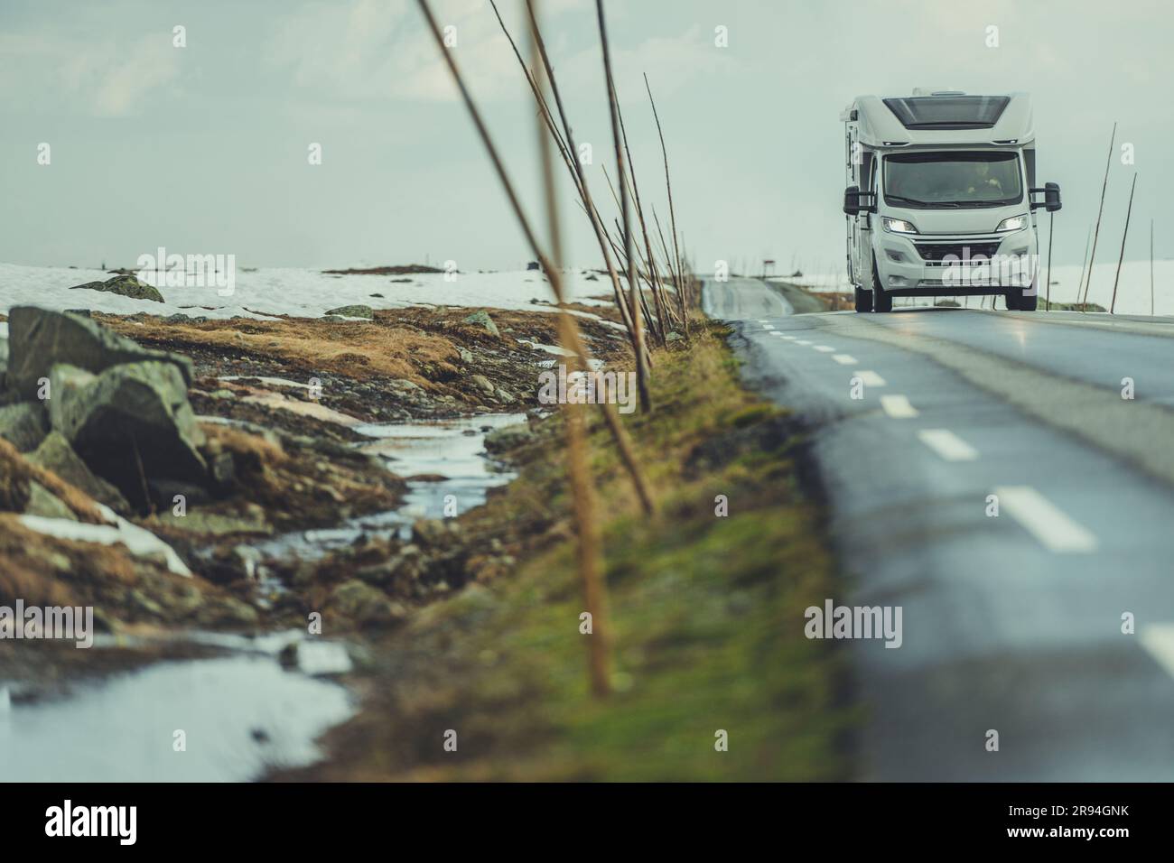 Family Crossing Norwegian Wilderness in a Camper Van RV. Modern ...