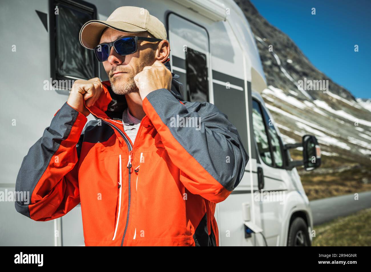 Caucasian Men Wearing Raincoat and Getting Ready For a Hike While ...