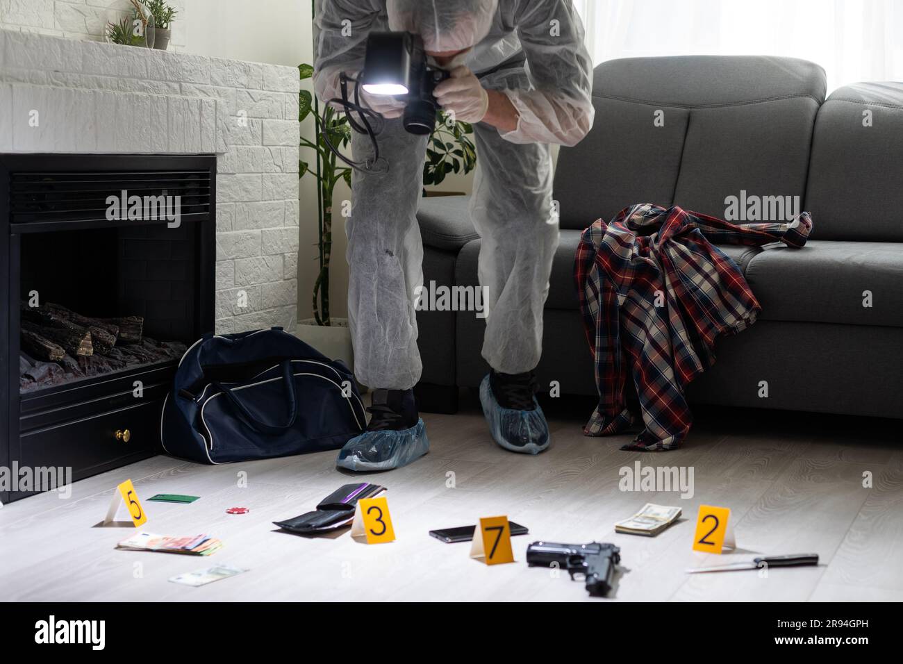 Crime scene investigation - collecting pistol and cartridges by ...