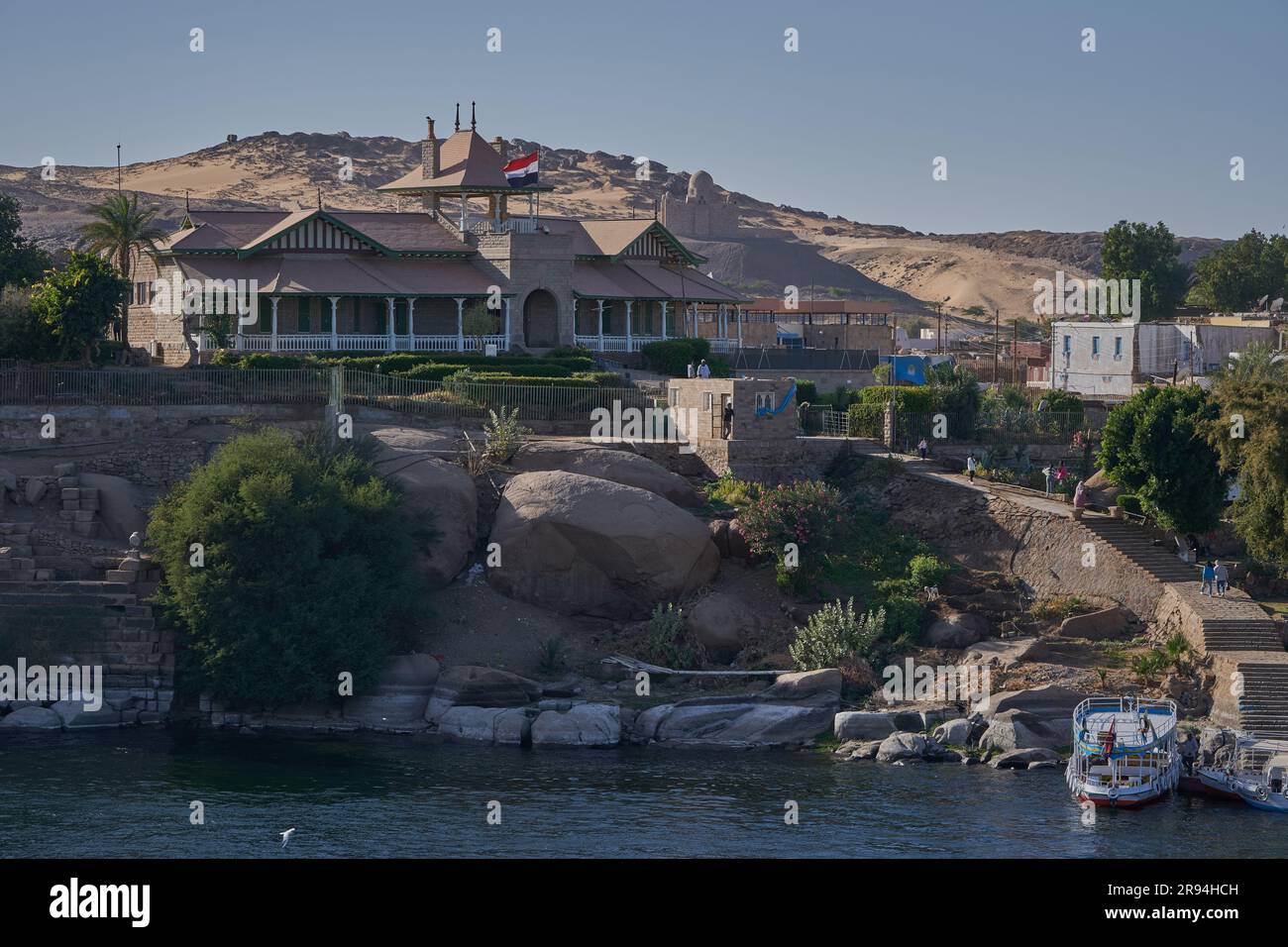 Nile river in Aswan, Egypt afternoon shot showing feluccas and boats in ...