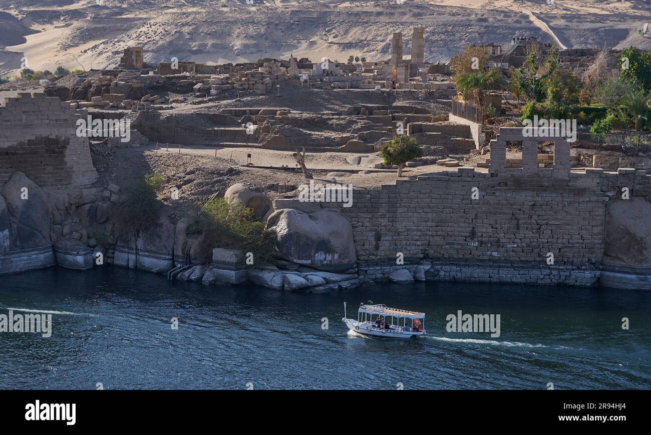 Nile river in Aswan, Egypt afternoon shot showing feluccas and boats in ...