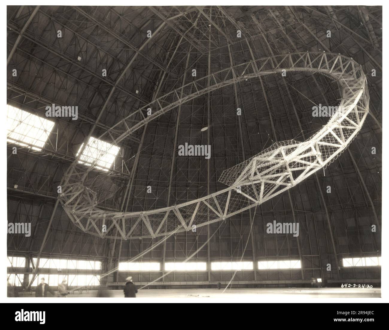 Photograph Rising the First Main Frame of a Dirigible. Original caption ...