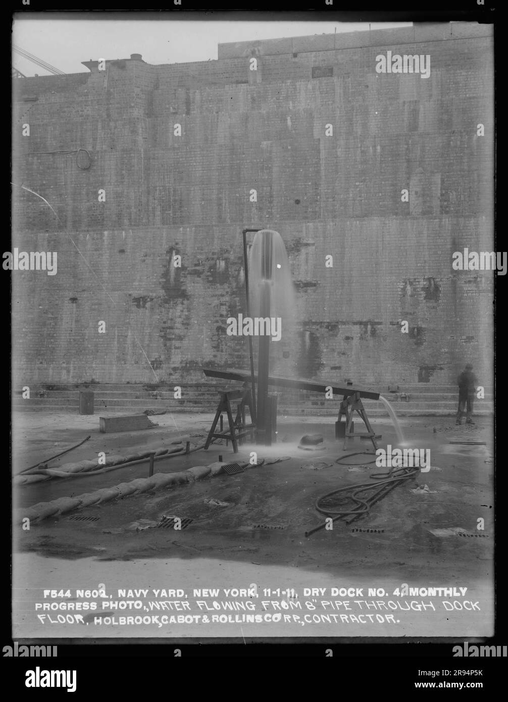Monthly Progress Photo, Dry Dock No. 4, Water Flowing from 8" Pipe ...