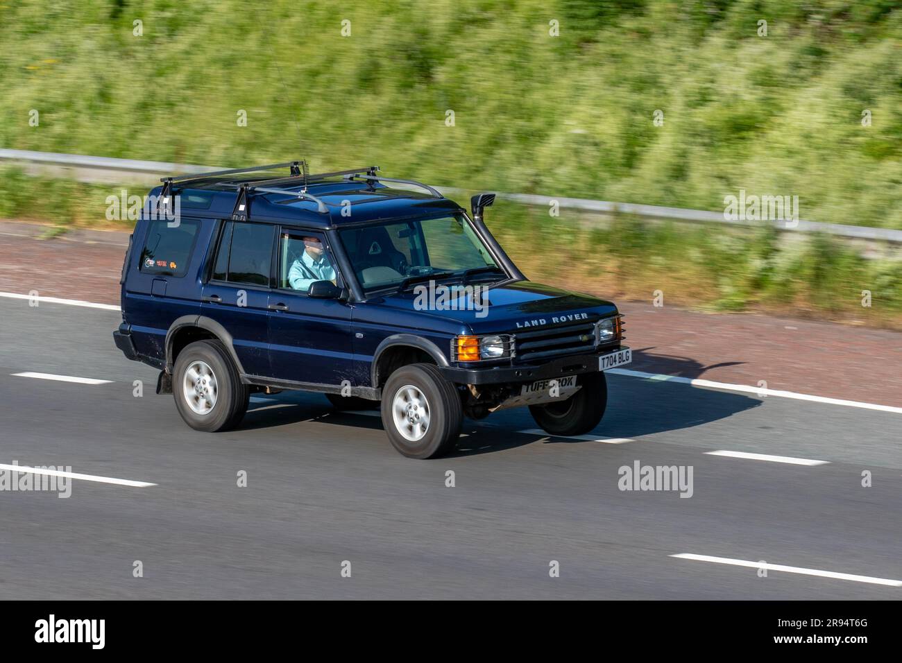1999 90s nineties Blue Land Rover Discovery TD5 S; travelling at speed ...