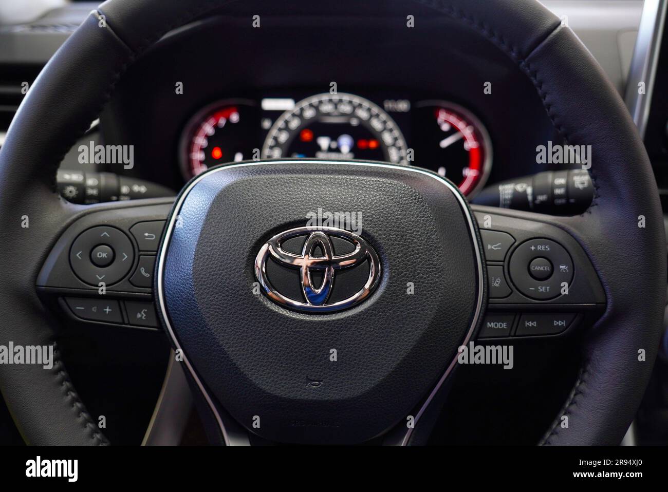 Close-up of a Toyota vehicle's dashboard, featuring the steering wheel ...