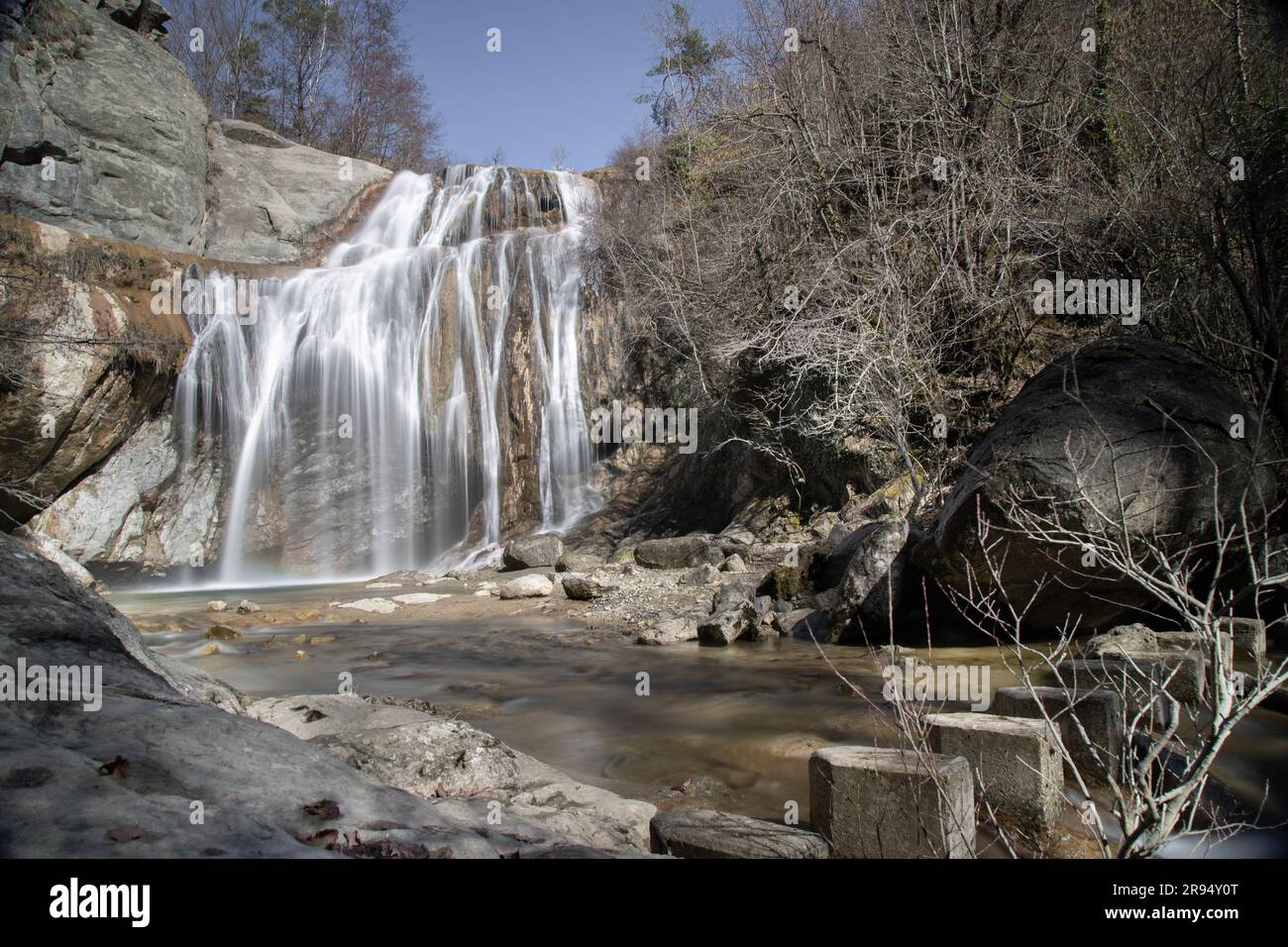 Landscape showing a waterfall Salt del Moli waterfall in Vidra town in ...